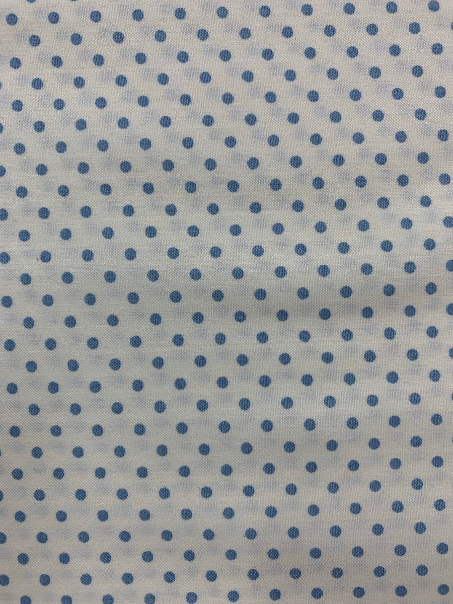 Sky blue dots on white background (sold in 25cm units)